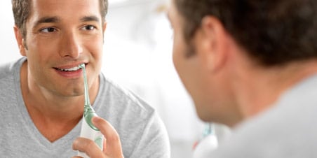 Cleaning between teeth: interdental brush vs floss I Philips